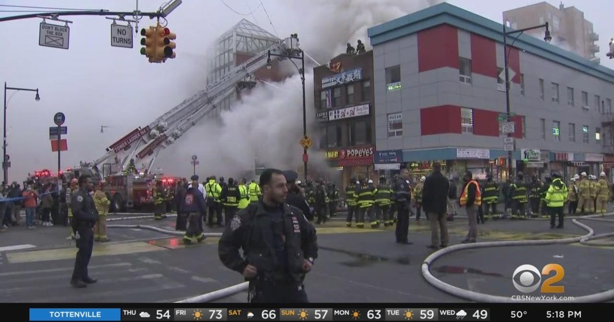 Firefighters battle five-alarm fire in Queens - CBS New York