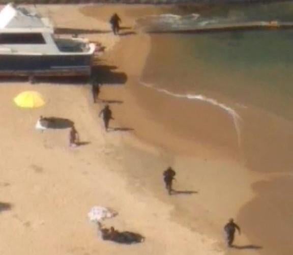 At least 3 dead after shooting, dramatic police chase on beach in ...