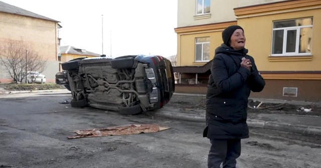 Residents react to alleged massacre by Russian forces in Bucha - CBS News