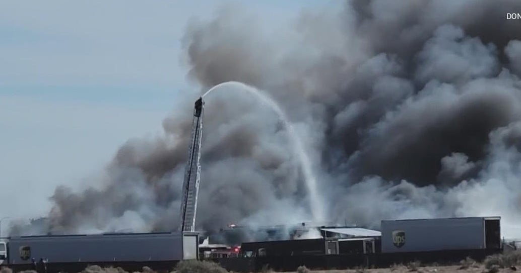 Second-alarm fire burns UPS warehouse, big rig trailers in Lancaster ...