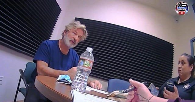 New bodycam footage from "Rust" shooting released - CBS News