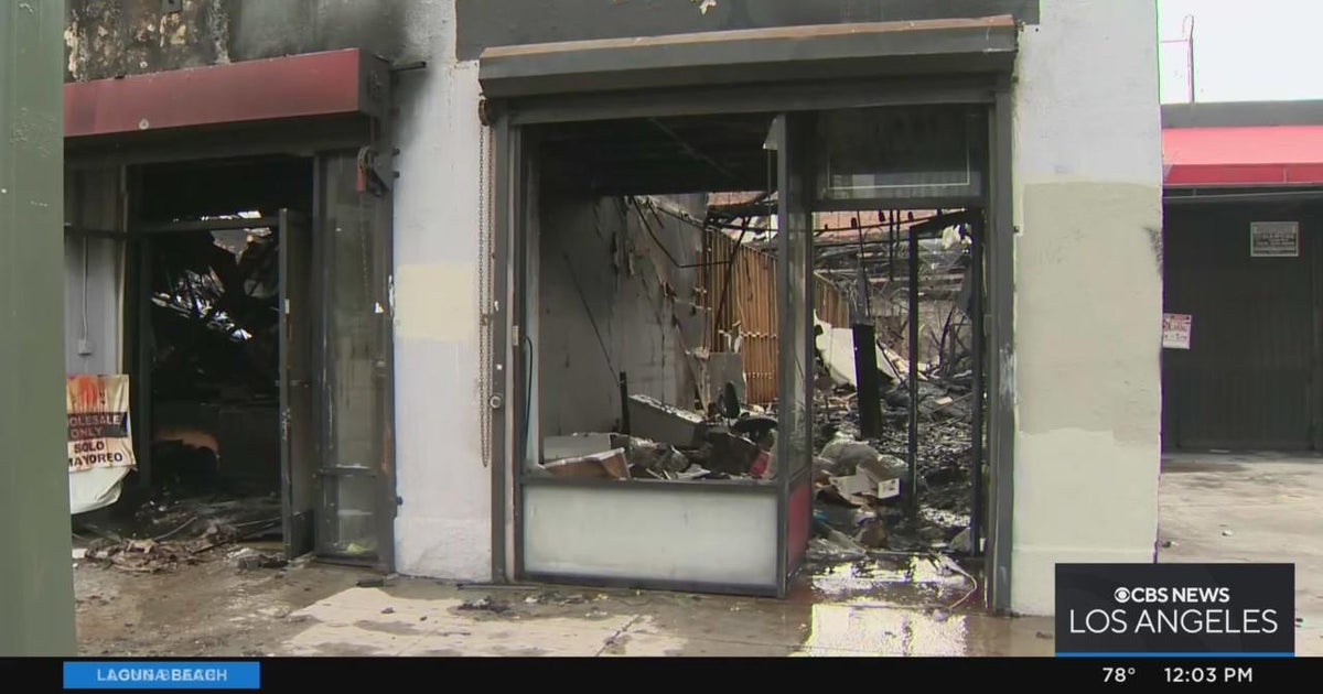 Massive fire rips through downtown LA commercial building for second ...