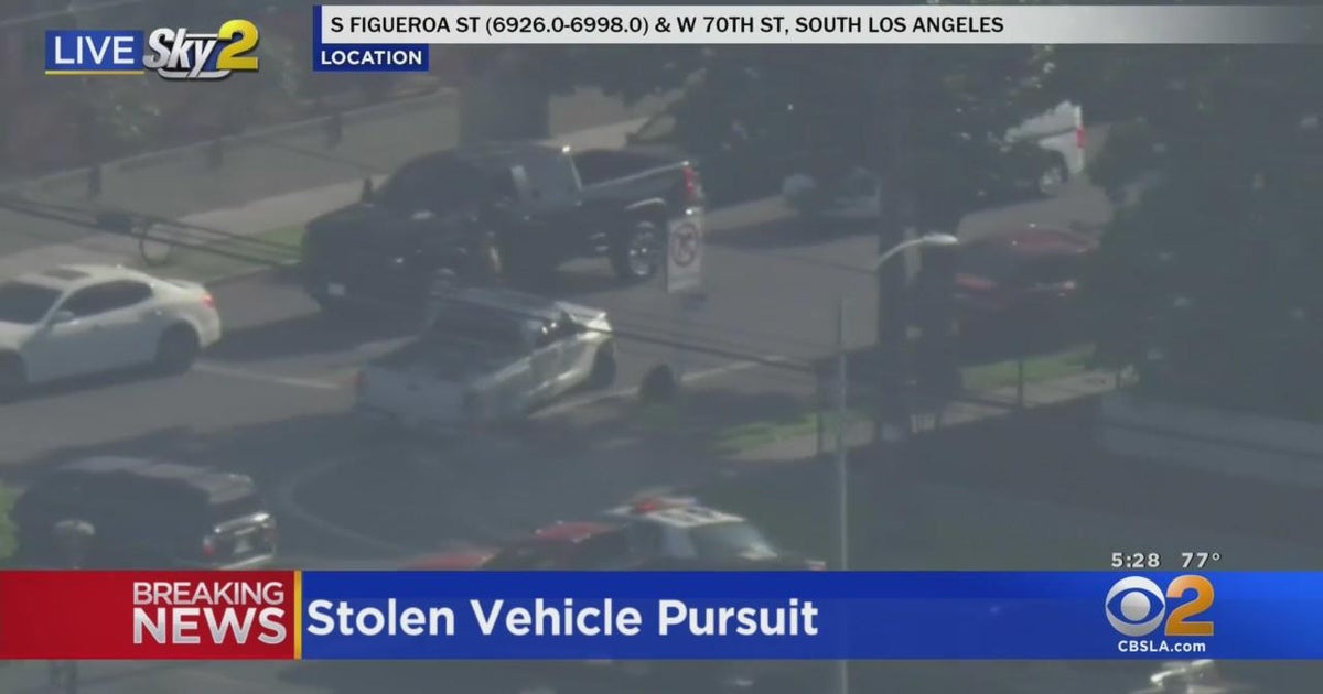 Stolen vehicle catches fire after spike strip - CBS Los Angeles