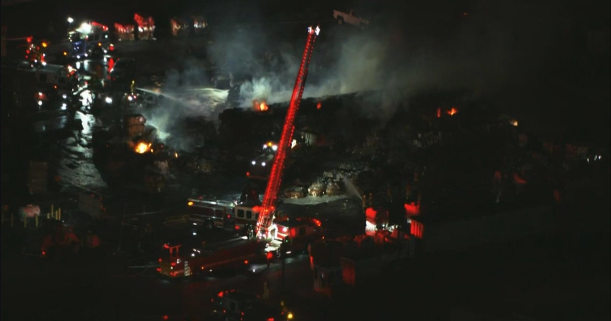 Over 200 bales of cardboard catch on fire in Fontana - CBS Los Angeles