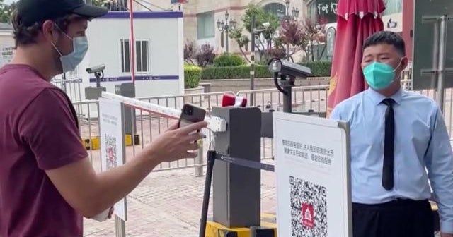 Here's what a day under China's vast COVID testing system looks like ...