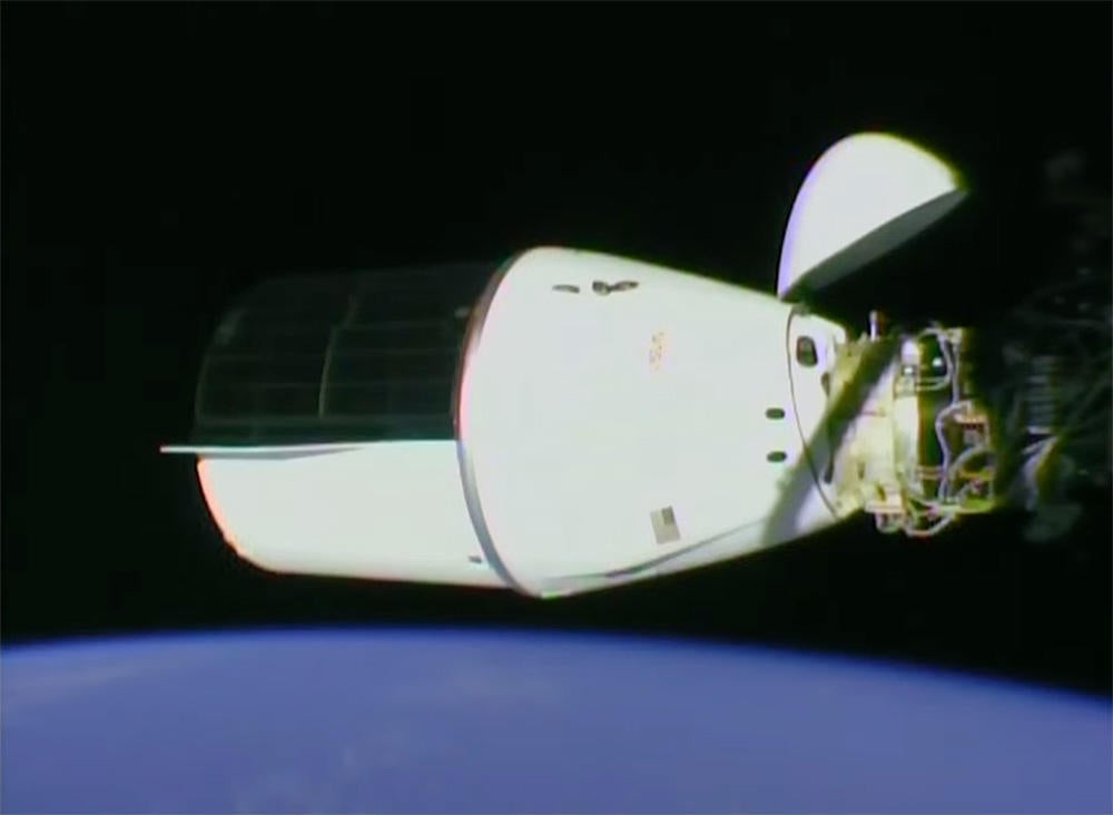 SpaceX cargo ship docks with International Space Station - CBS News