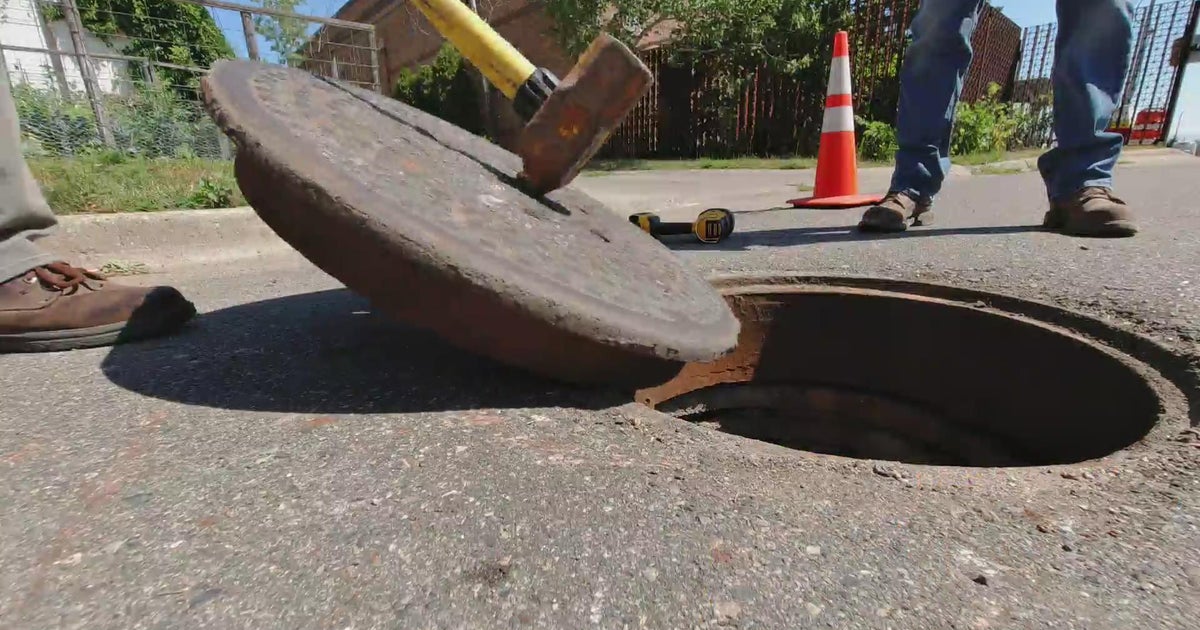 Good Question: Why aren’t manholes flush with the street? - CBS Minnesota