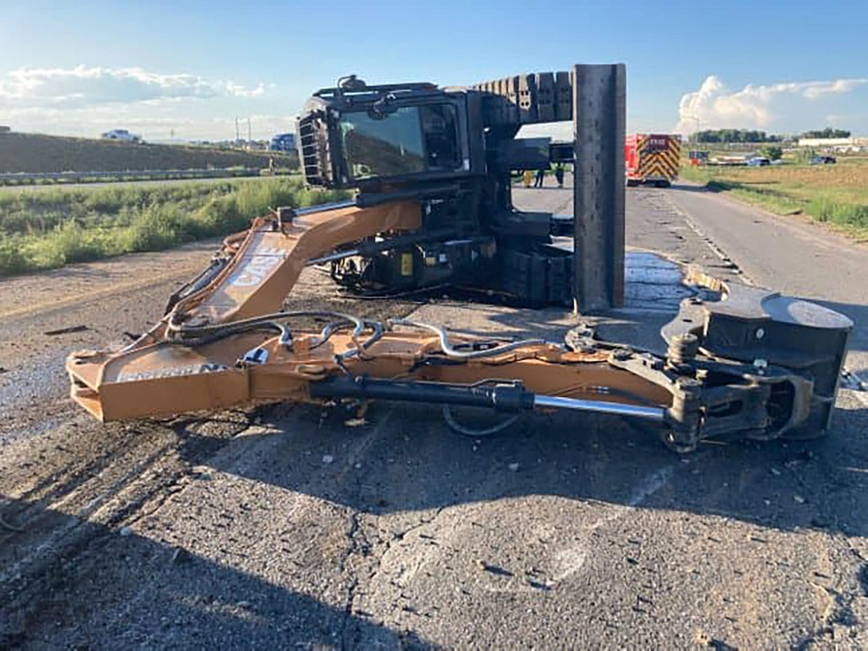 Excavator being hauled by semi crashes into bridge on I-25 in northern ...