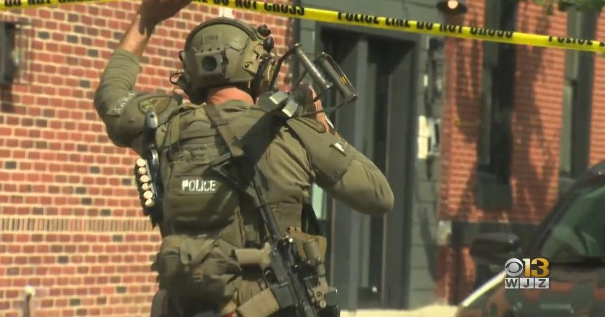 Shooting suspect in custody after barricade, school lockdown near ...