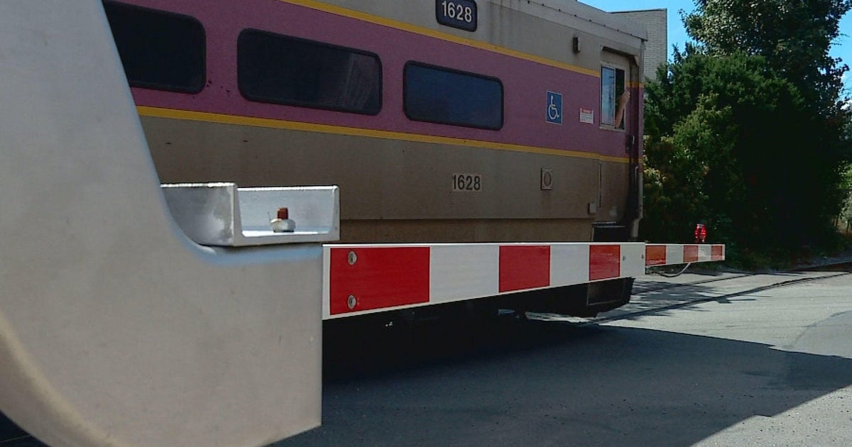 Gloucester declares emergency after train crossing arms hit cars - CBS ...