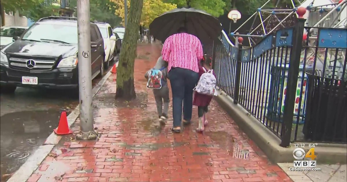Students get rainy start to the new school year in Cambridge - CBS Boston