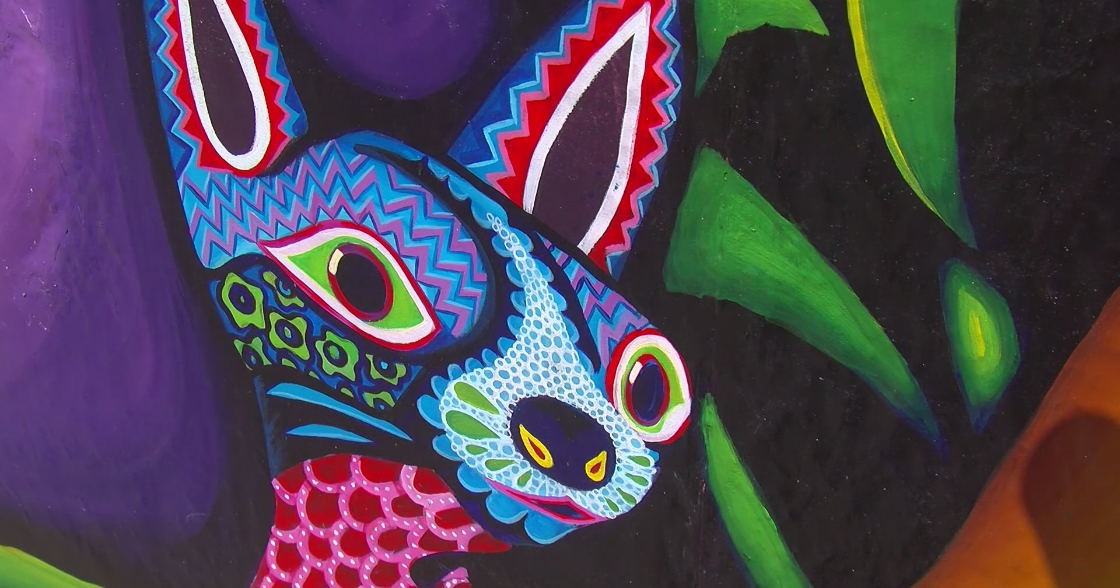 Community uses dozens of murals to fight graffiti along Lake St. - CBS ...