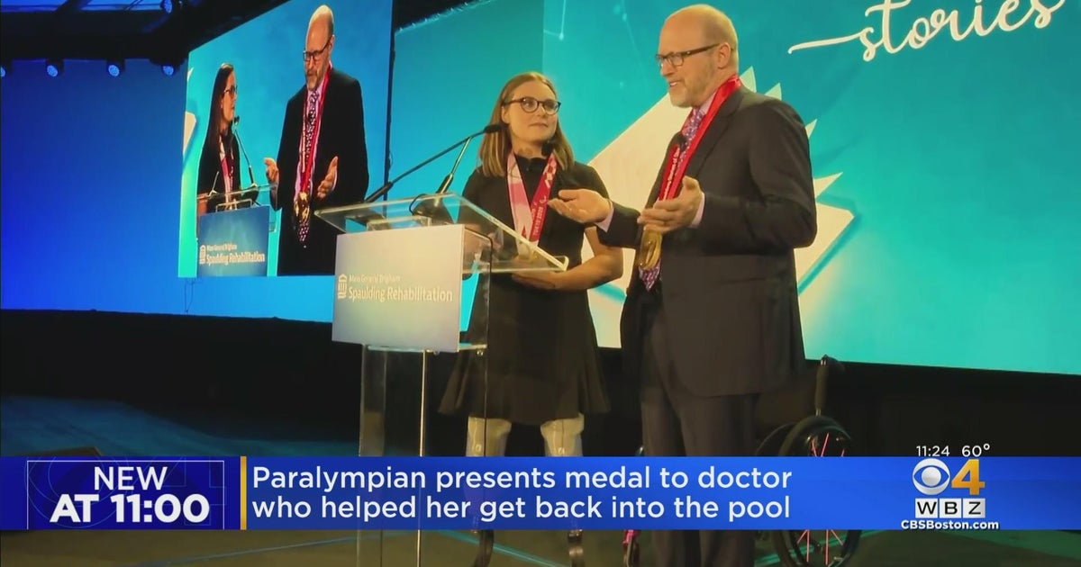 Paralympian presents medal to Spaulding doctor who helped her get back ...