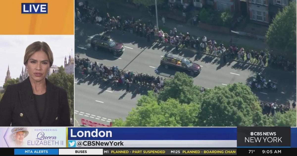 Millions line streets as motorcade carries Queen Elizabeth II's coffin ...
