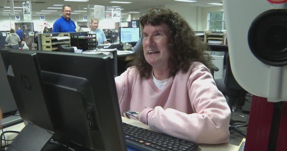 Wisconsin DMV photographer has taken half a million pics - CBS Minnesota