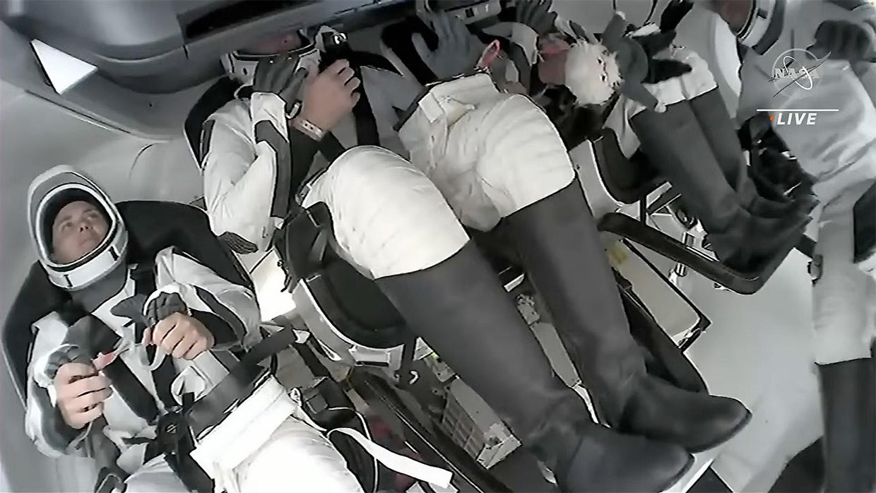 SpaceX Crew Dragon launch takes Russian cosmonaut, NASA crewmates on ...