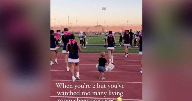 Toddler memorizes sister's cheer routine - CBS News