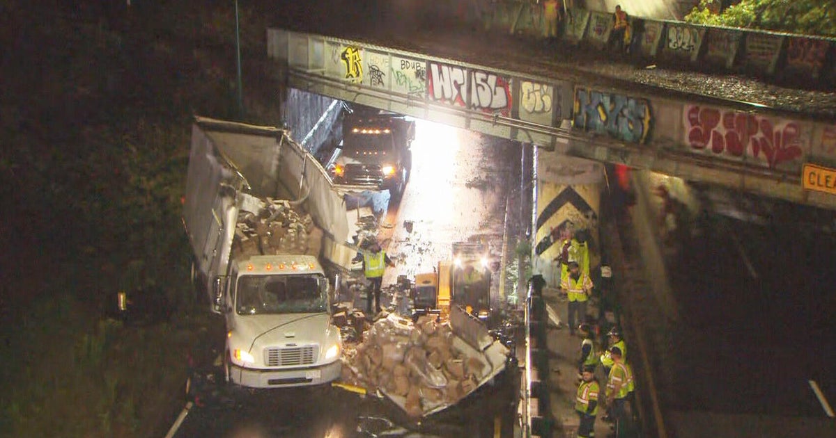 Part of Storrow Drive closed for hours after truck crashes, spills ...