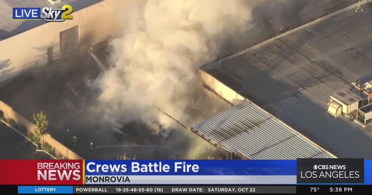 Firefighters engage second alarm fire in Monrovia - CBS Los Angeles