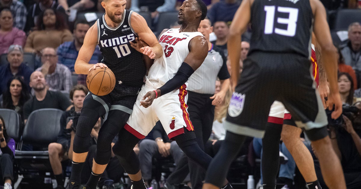 Kings outlast Heat 119-113, win first game of Mike Brown era - CBS ...