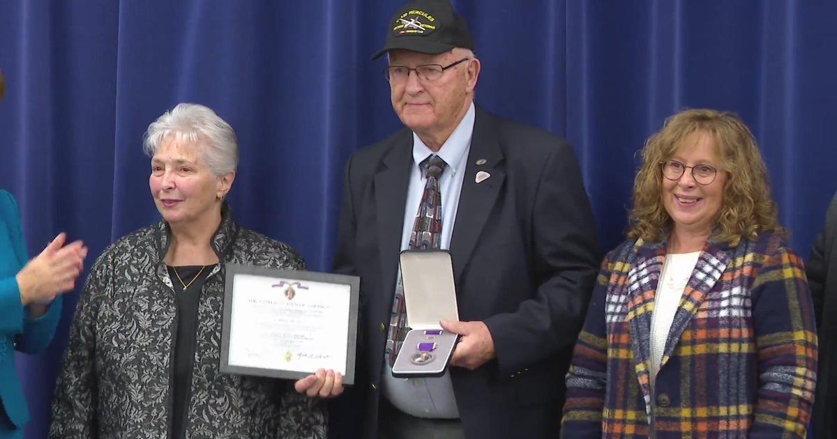 Family accepts Purple Heart for late veteran Charles Shepherd, wounded ...