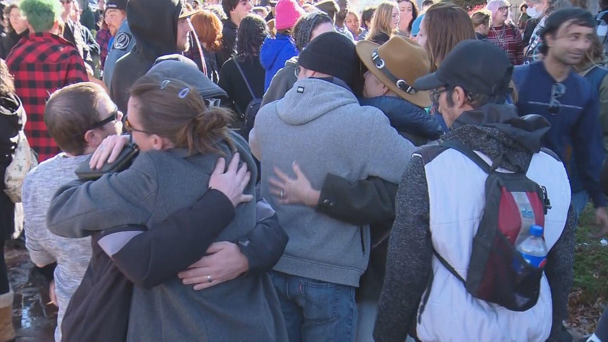 Community gathers for vigil to remember those killed in Club Q shooting ...