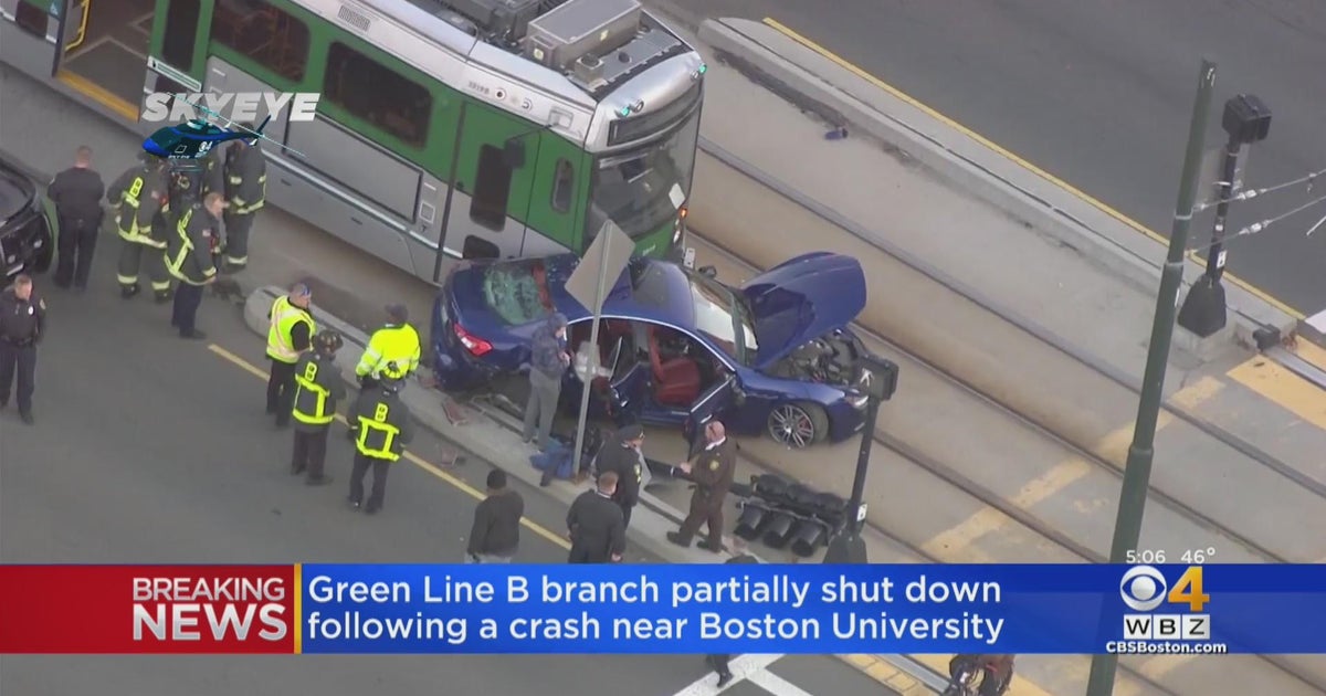 Green Line train crashes into Maserati near BU Bridge - CBS Boston