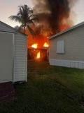 Photos from scene: Florida City trailer home fire