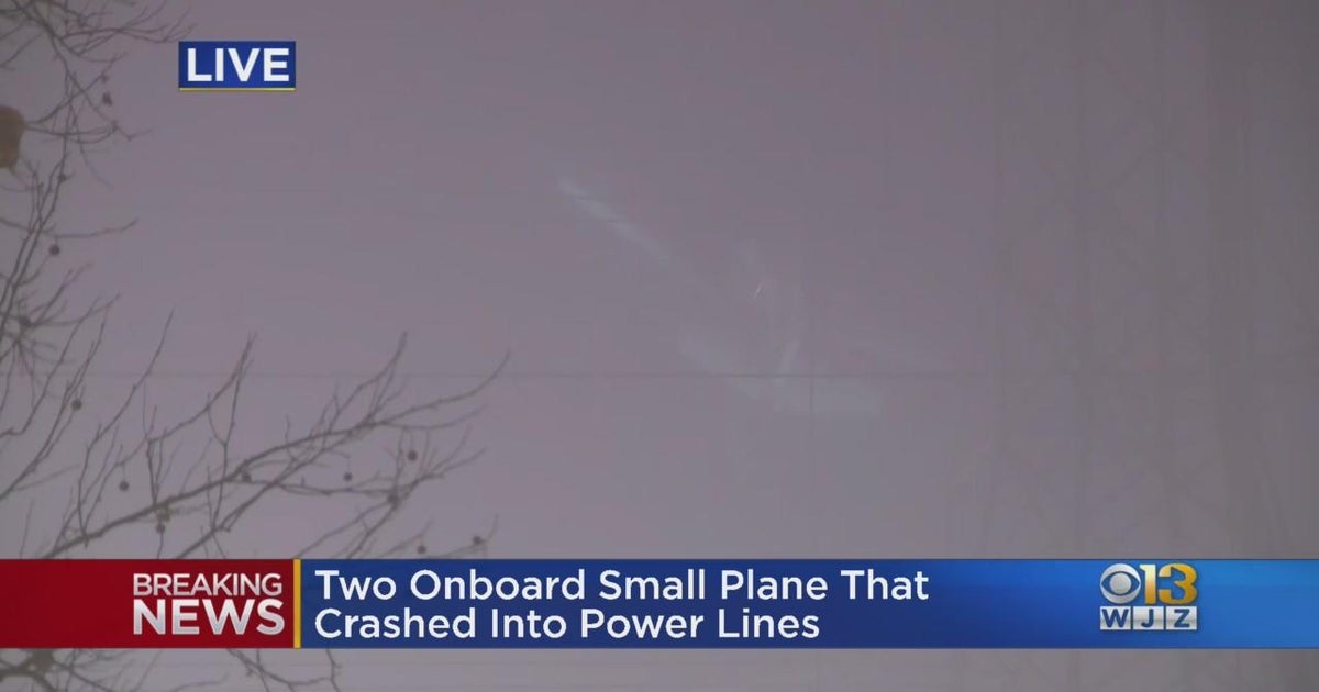 Two trapped 'hundred feet in air' hours after small plane crashed into ...