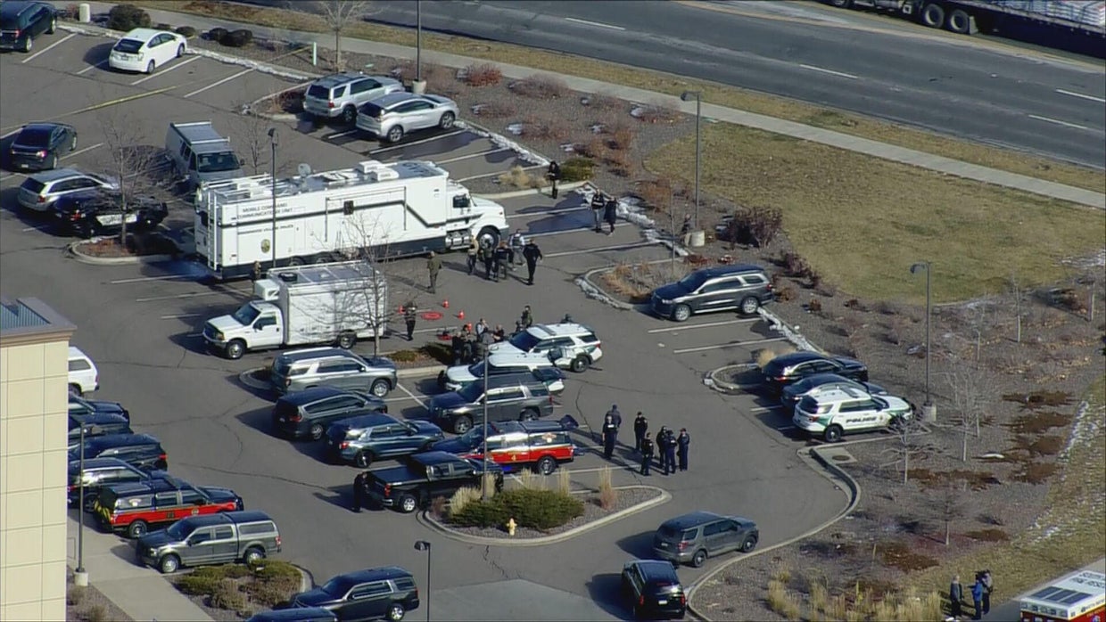 Bank robbery suspect exchanges gunfire with Greenwood Village police ...