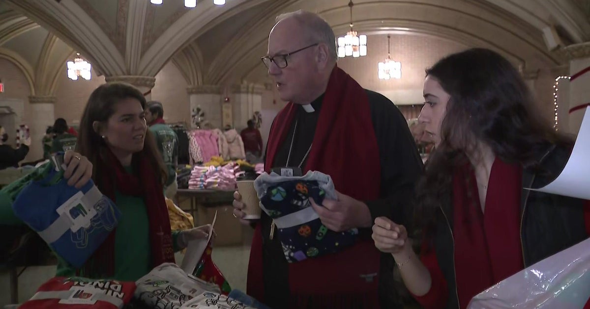 Timothy Cardinal Dolan joins volunteers for Catholic Charities winter ...