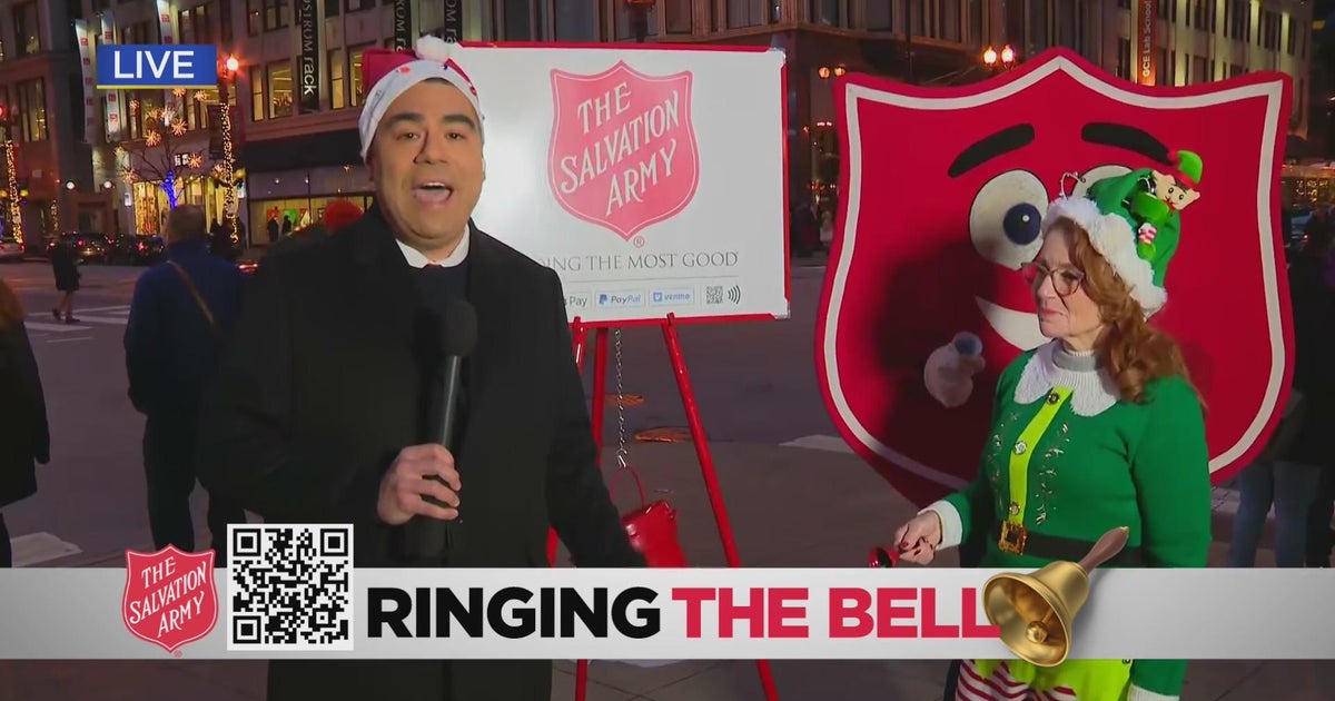 Albert Ramon and Tina Evans ringing the bell for the Salvation Army ...