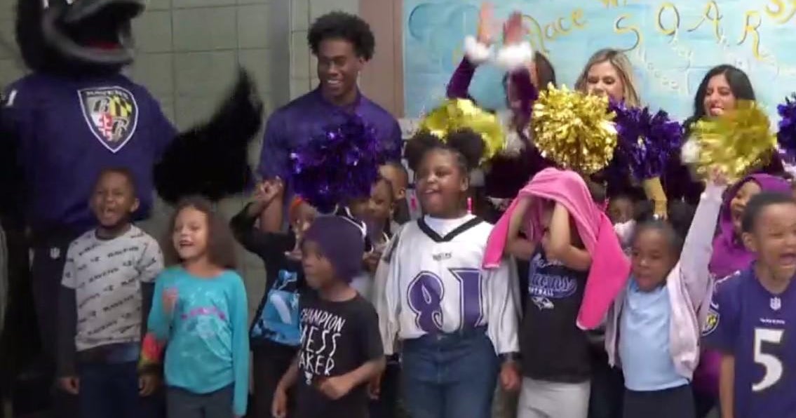 Ravens, partners host food distribution for families at elementary ...