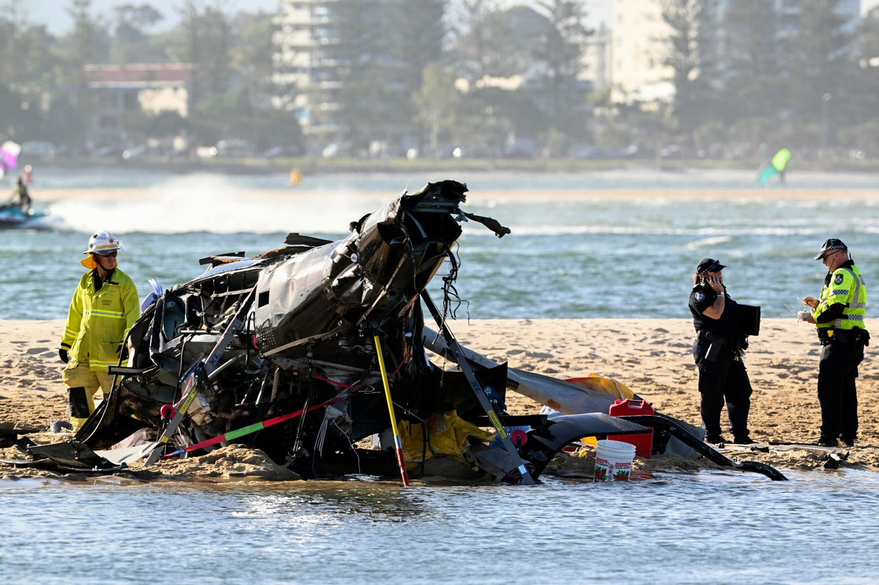 Helicopters collide over Australian tourist hotspot, killing 4 - CBS News