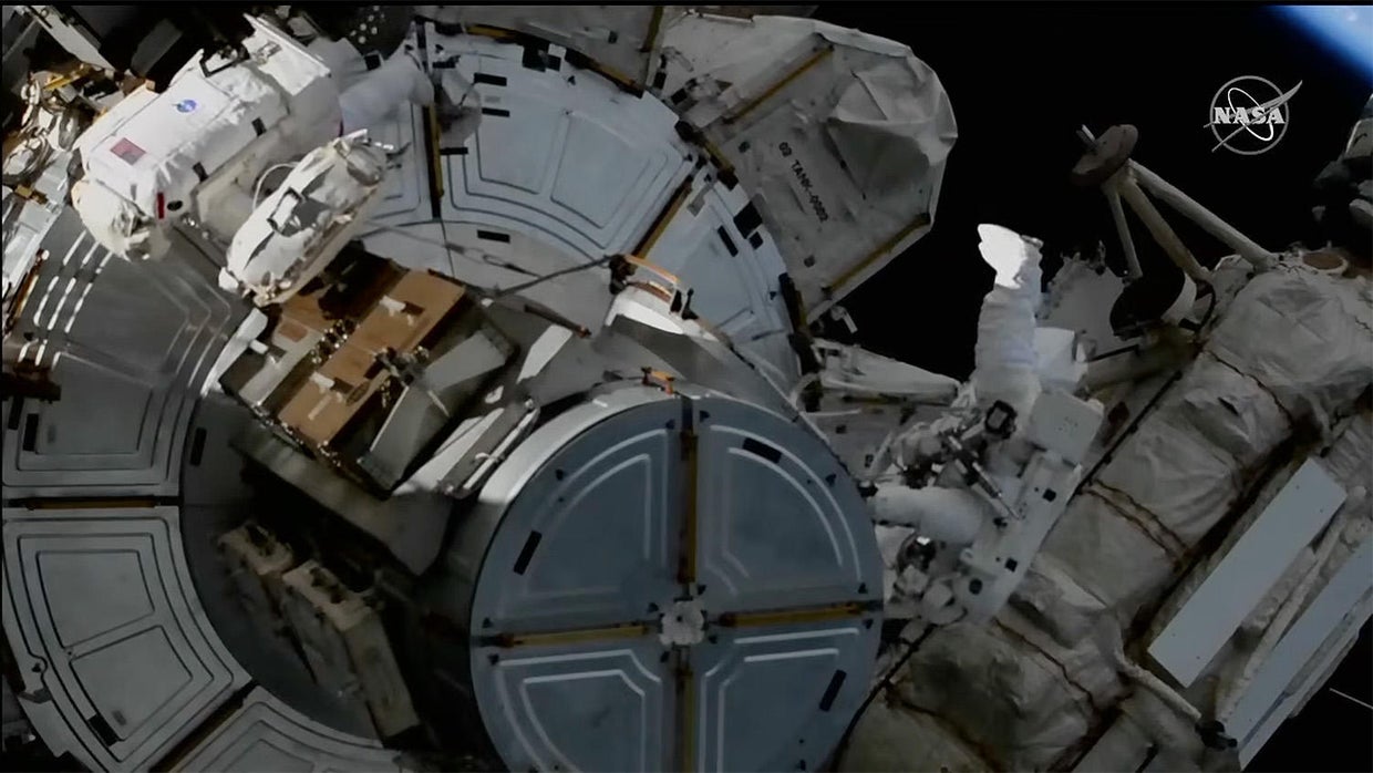 Two spacewalkers continue space station power system upgrade - CBS News