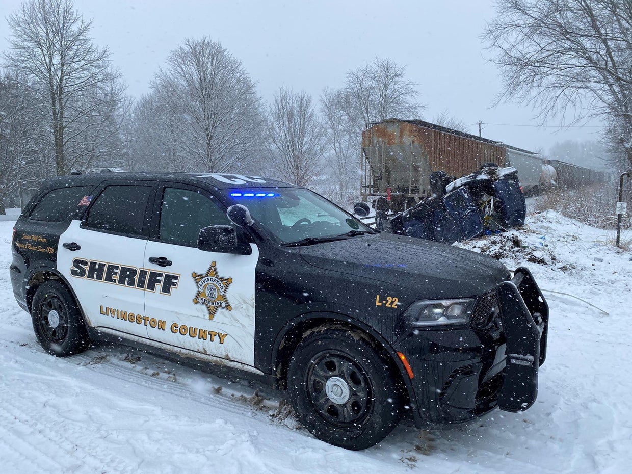 Van struck by train in Livingston County after sliding on icy road ...