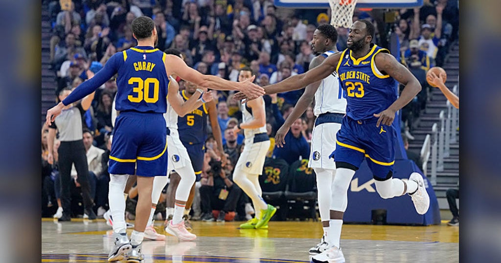 Curry injures left leg leading Warriors over Mavs 119-113 - CBS San ...