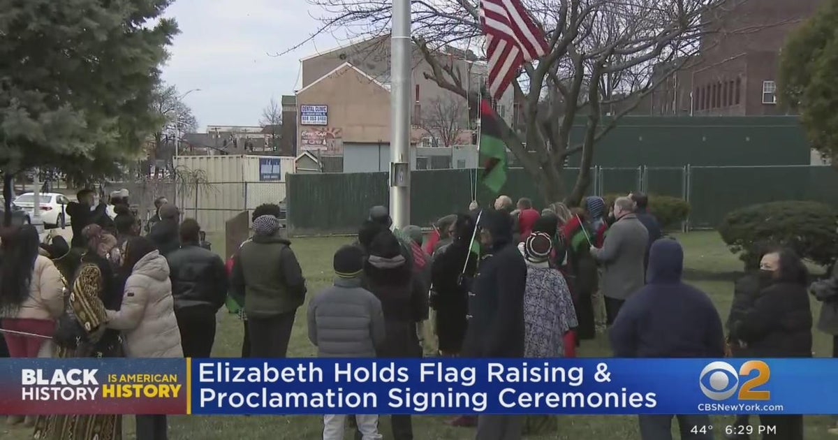 Elizabeth holds flag raising and proclamation signing ceremonies - CBS ...