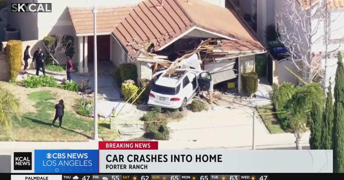 SUV crashes into garage of Porter Ranch house - CBS Los Angeles