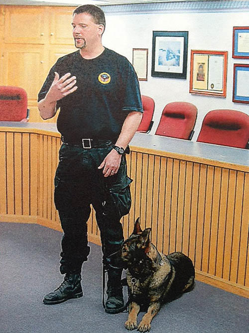 Officer Sean Sluganski, Chief Justin McIntire among dozen of line of ...