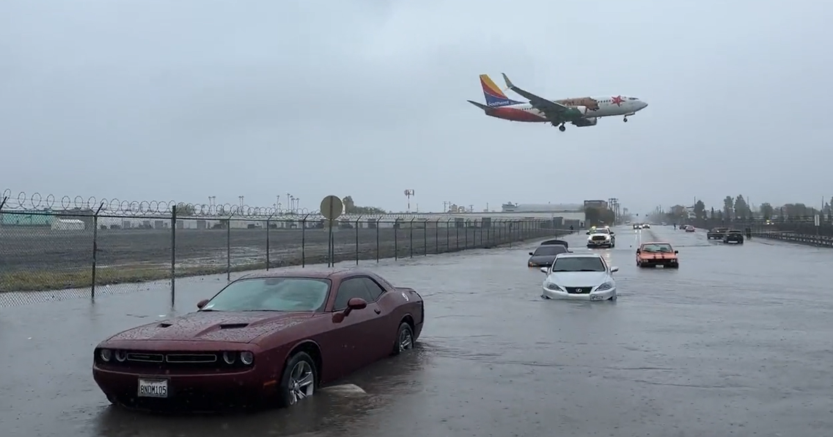 Flooded streets trap at least 6 cars outside of Hollywood-Burbank ...