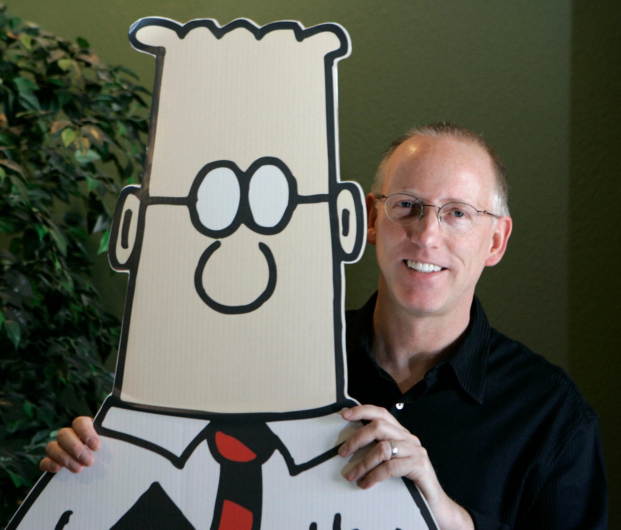 Dilbert distributor cuts ties to comic strip's creator Scott Adams over ...