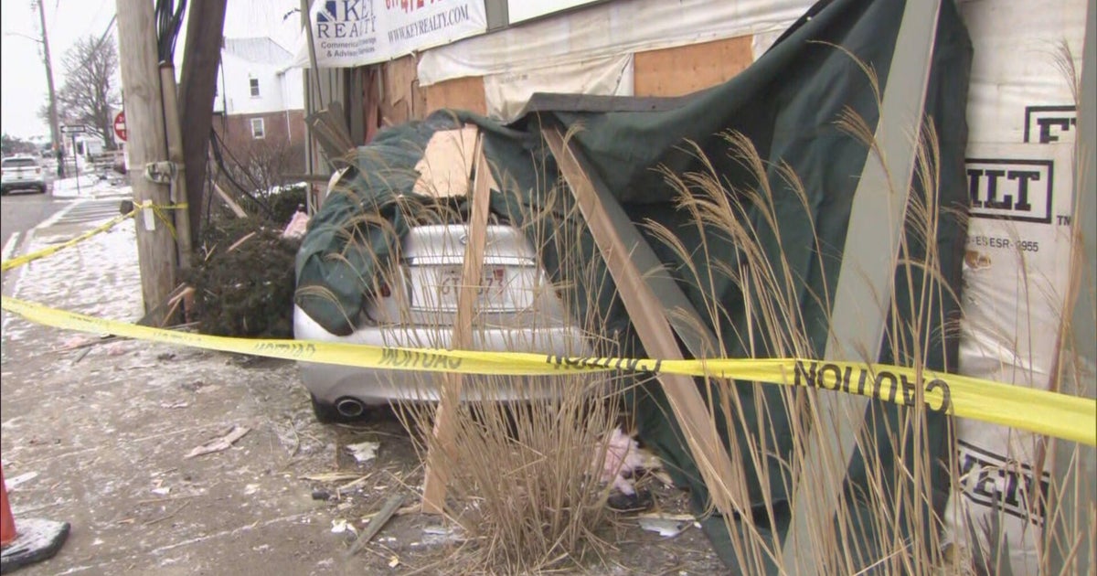 Car crashes into Milton building, causing severe damage - CBS Boston