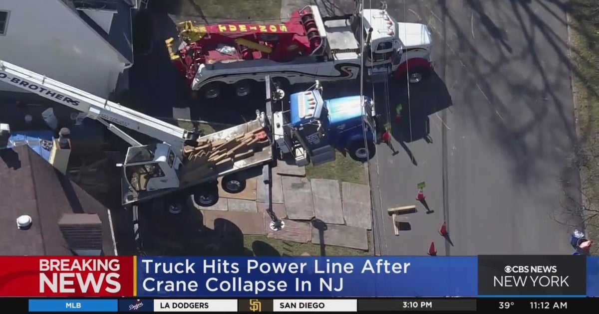 Crane topples over, sends truck into power lines in New Jersey - CBS ...