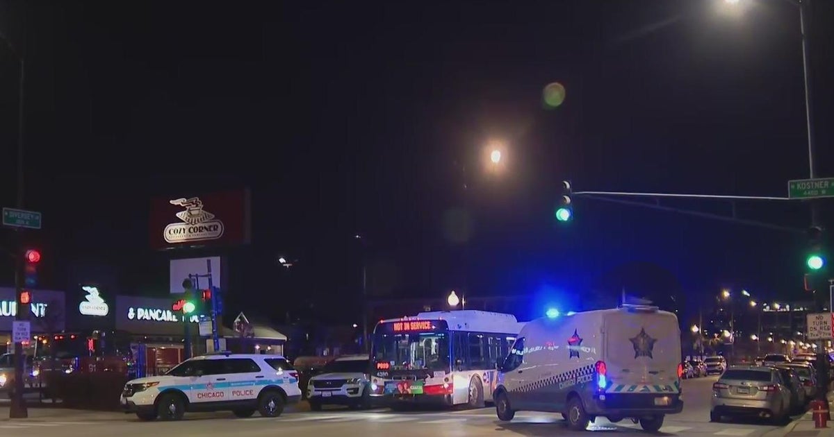 SWAT teams surround home on Northwest Side - CBS Chicago