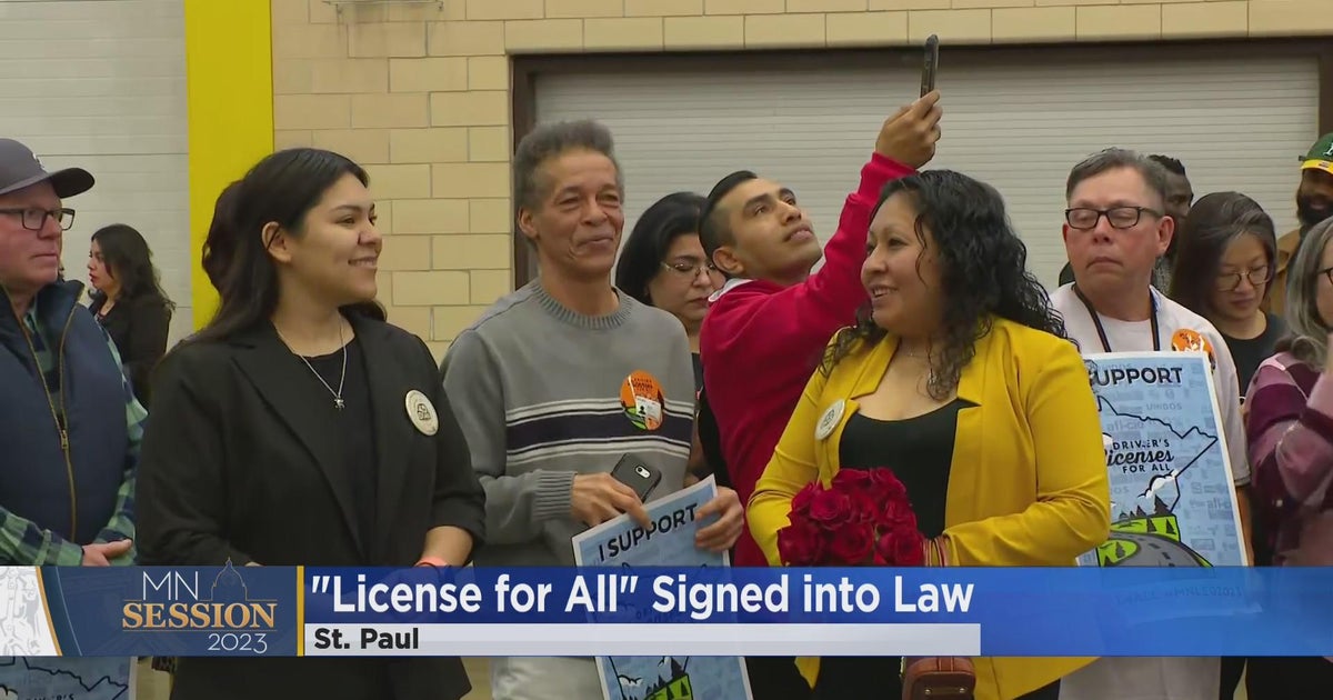 Supporters celebrate signing of "driver's licenses for all" bill - CBS ...