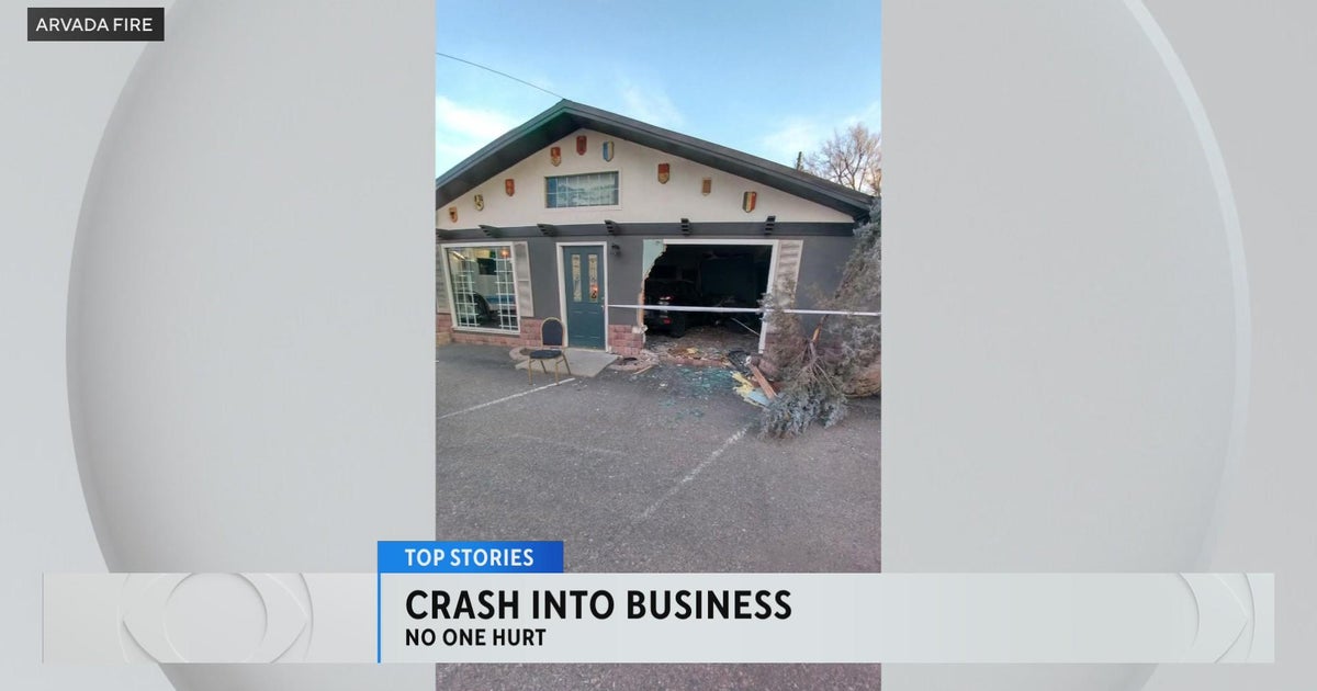 Car crashes through window of business in Arvada - CBS Colorado