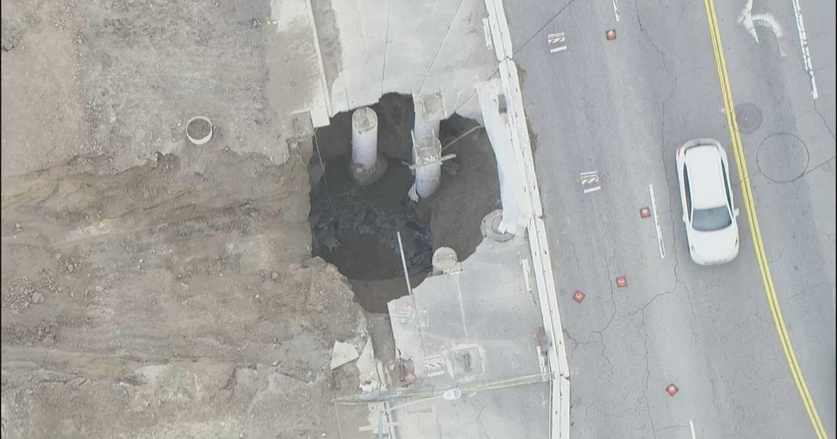 Massive sinkhole opens up near 118 Freeway in Porter Ranch - CBS Los ...