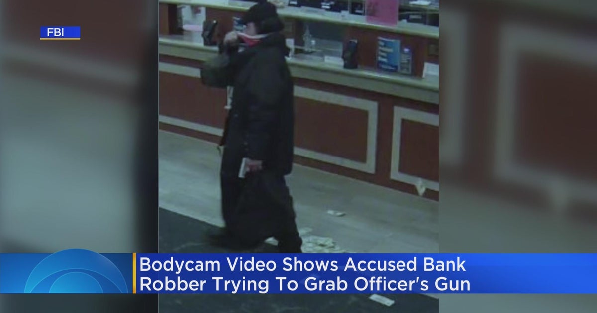 Body cam video shows accused robber trying to grab Joliet officer's gun ...