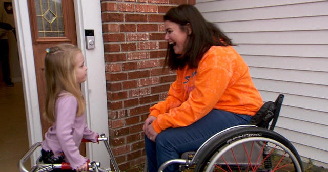 Friendship between coach and 5-year-old girl with cerebral palsy - CBS News